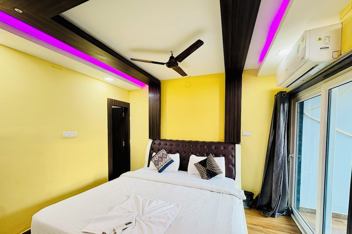 Quarto casal luxo, vista para a cidade | Wi-Fi de cortesia, roupa de cama