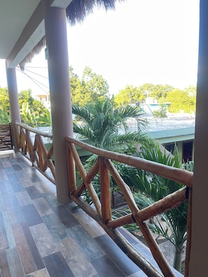 Quarto Quádruplo Comfort, vista para o jardim | Terraço/pátio interior