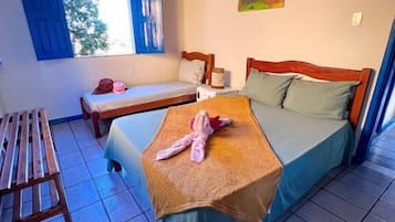 Quarto triplo, vista para o jardim | Wi-Fi de cortesia