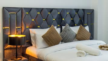 Apartamento exclusivo, 2 quartos | Ferros/tábuas de passar roupa, Wi-Fi de cortesia, roupa de cama