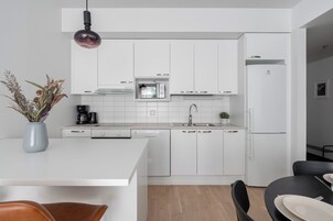 Apartamento Superior, varanda, vista para o pátio | Cozinha privada