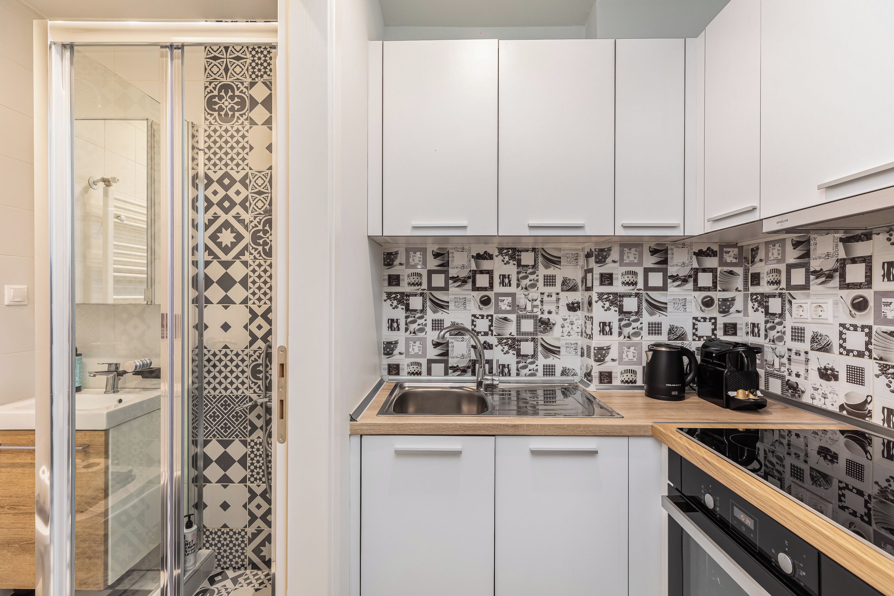 Apartamento, 2 quartos, varanda, Vista para a cidade | Cozinha privada | Uma máquina de café expresso, uma chaleira elétrica 