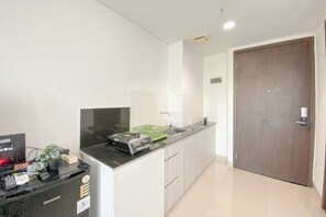 Apartamento Standard | Cozinha privada | Utensílios de cozinha 