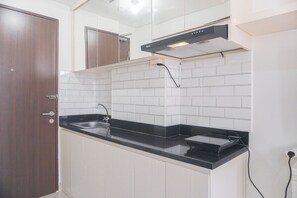 Apartamento Standard | Cozinha privada | Utensílios de cozinha