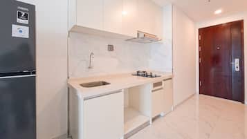 Apartamento standard | Cozinha privada | Talheres/pratos/utensílios de cozinha