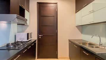 Apartamento Standard | Cozinha privada | Utensílios de cozinha