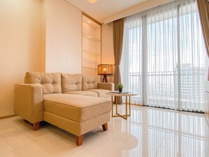 Apartamento Deluxe | Sala de estar