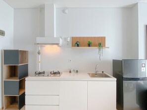 Apartamento Deluxe | Cozinha privada | Utensílios de cozinha