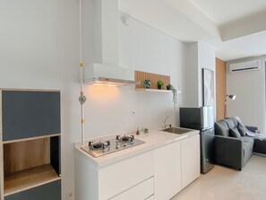 Apartamento Deluxe | Cozinha privada | Utensílios de cozinha