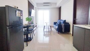 Apartamento Deluxe | Sala de estar