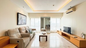 Apartamento Deluxe | Sala de estar