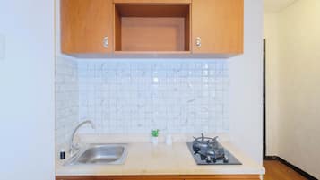 Apartamento luxo | Cozinha privada | Cooktop, talheres/pratos/utensílios de cozinha