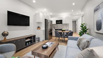 Apartamento Comfort, Vista para a cidade | Sala de estar