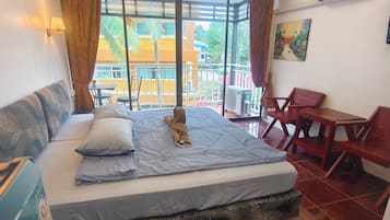 Quarto duplo clássico, sacada, vista para o oceano | Cofres nos quartos, cortinas blackout, Wi-Fi de cortesia, roupa de cama
