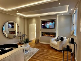 Suíte superluxo, vista para o jardim | Parte interna