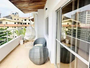 Quarto júnior, sacada, vista para a cidade | Vista da sacada