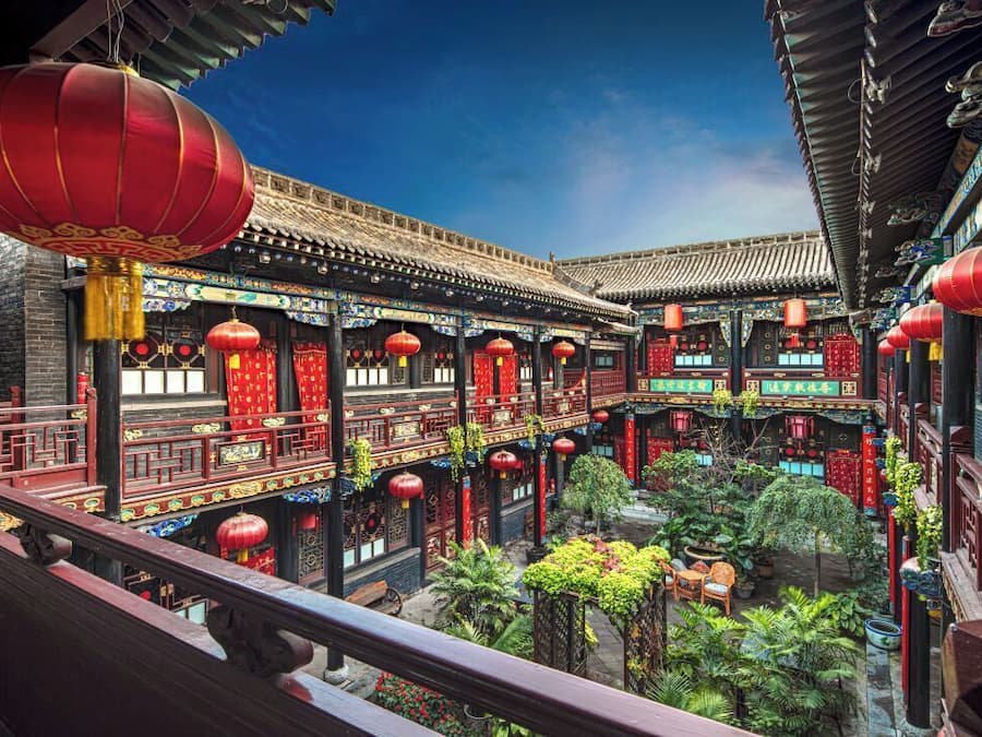 Quarto superluxo, vista para o pátio | Área de estar