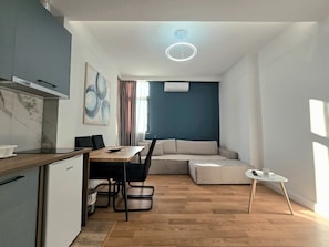 Apartamento Standard | Sala de estar | Smart TV de 40 polegadas com canais por cabo 