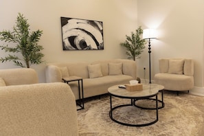 Apartamento Deluxe | Sala de estar