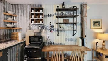 Estúdio, 1 cama Queen, cozinha americana | Área de estar