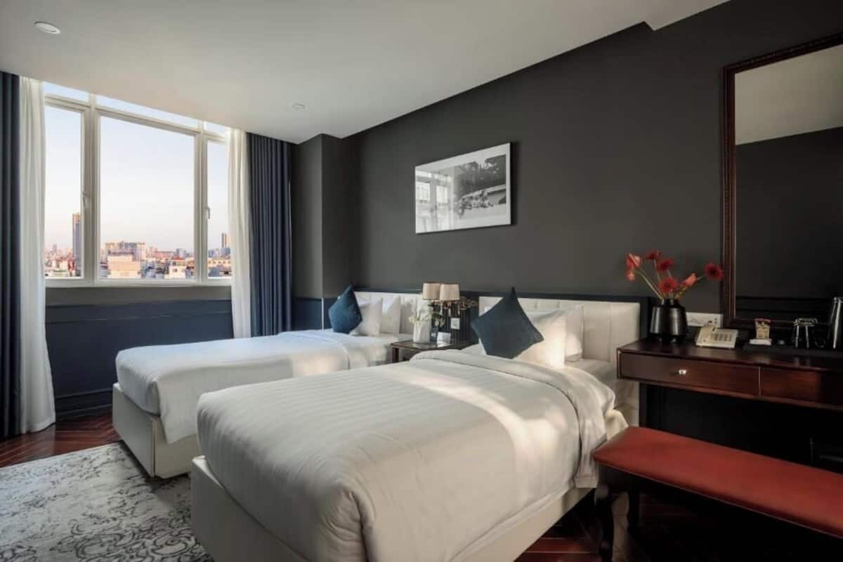 Quarto Duplo Deluxe, Vista para a cidade | Ferro/tábua de engomar, Wi-fi grátis