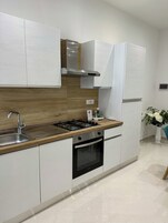 Apartamento Deluxe | Cozinha privada