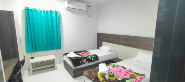 Quarto triplo luxo | Wi-Fi de cortesia