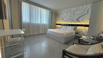Quarto Duplo Deluxe | Minibar, com decoração personalizada, com mobília individualizada