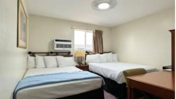 Cortinas blackout, Wi-Fi de cortesia, roupa de cama