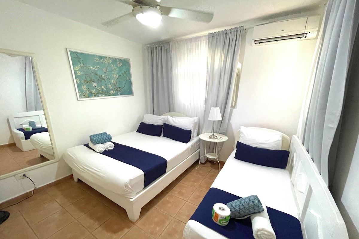 Villa, vista para o jardim, junto à praia | Cofre no quarto, Wi-fi grátis