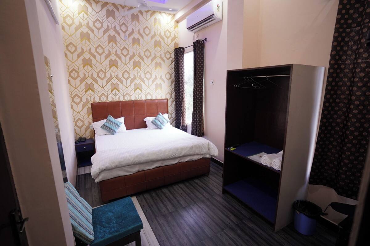 Quarto casal luxo, vista para a cidade | Wi-Fi de cortesia, roupa de cama