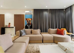 Apartamento Deluxe, varanda, Vista para a cidade | Sala de estar