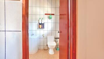 Suite Standard | Casa de banho | Um polibã, toalhas fornecidas