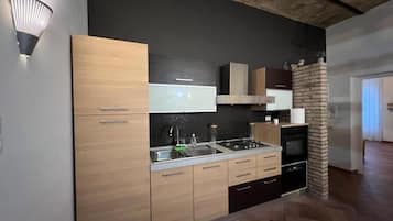 Apartamento, Vista para a cidade | Cozinha privada