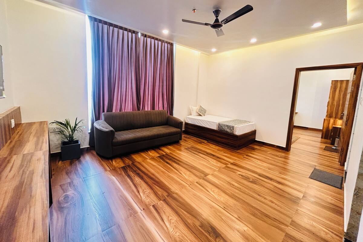 Quarto premium, vista para a cidade | Wi-Fi de cortesia, roupa de cama