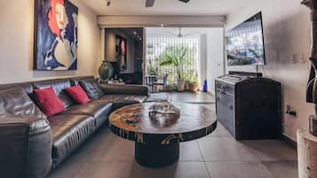 Condo, várias camas, terraço, vista para o oceano (La Palapa 106) | Área de estar