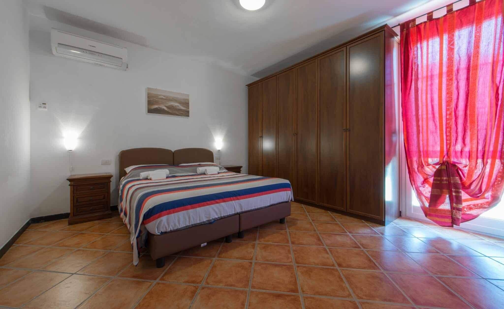 Appartamento in villa con piscina - piano terra | Cortinas/cortinados opacos, ferro/tábua de engomar 