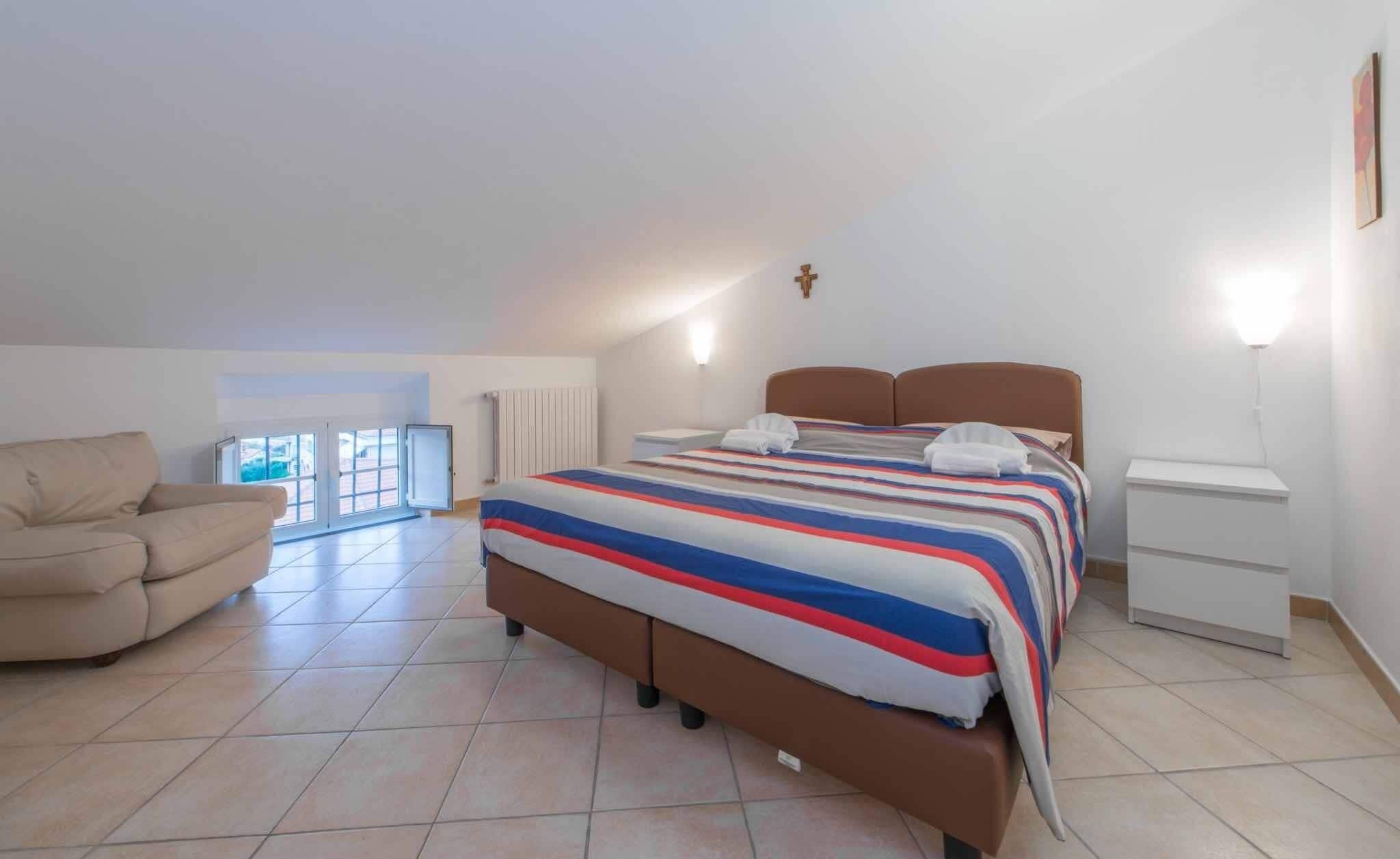 Appartamento in villa con piscina e terrazza panoramica | Cortinas/cortinados opacos, ferro/tábua de engomar 