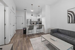 Apartamento standard, 1 quarto (Apartment) | Área de estar | Smart TV 50 polegadas com canais digitais