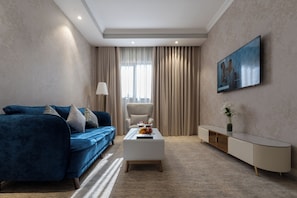 Suite Júnior, Vista para a cidade | Sala de estar