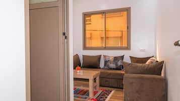 Quarto triplo conforto | Área de estar