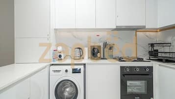 Apartamento, varanda, Vista para a cidade | Cozinha privada