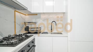 Apartamento, varanda, Vista para a cidade | Sala de estar