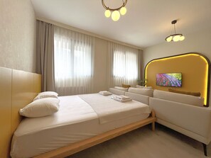 Quarto Duplo Deluxe | Cortinas/cortinados opacos, ferro/tábua de engomar, Wi-fi grátis