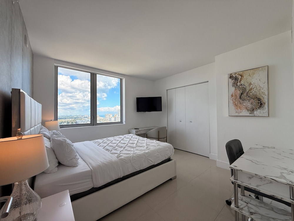 Sophisticated Miami Retreat at Beachwalk with Expansive Balcony Views ...