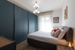 Apartamento conforto | Espaço de trabalho para notebook, ferros/tábuas de passar roupa