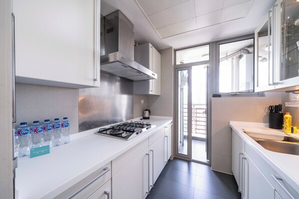 Apartamento Superior, 3 quartos, varanda, Vista para a cidade | Cozinha privada