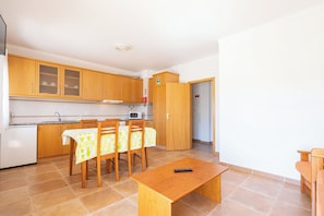Apartamento, 1 quarto, sacada | Área de estar