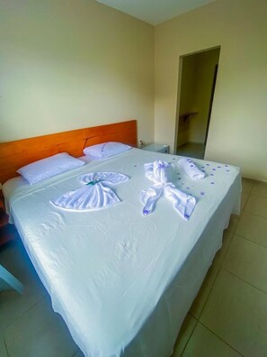 Quarto Triplo Superior, vista para a praia | Wi-fi grátis