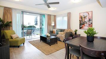 Apartamento, vista para a cidade | Área de estar
